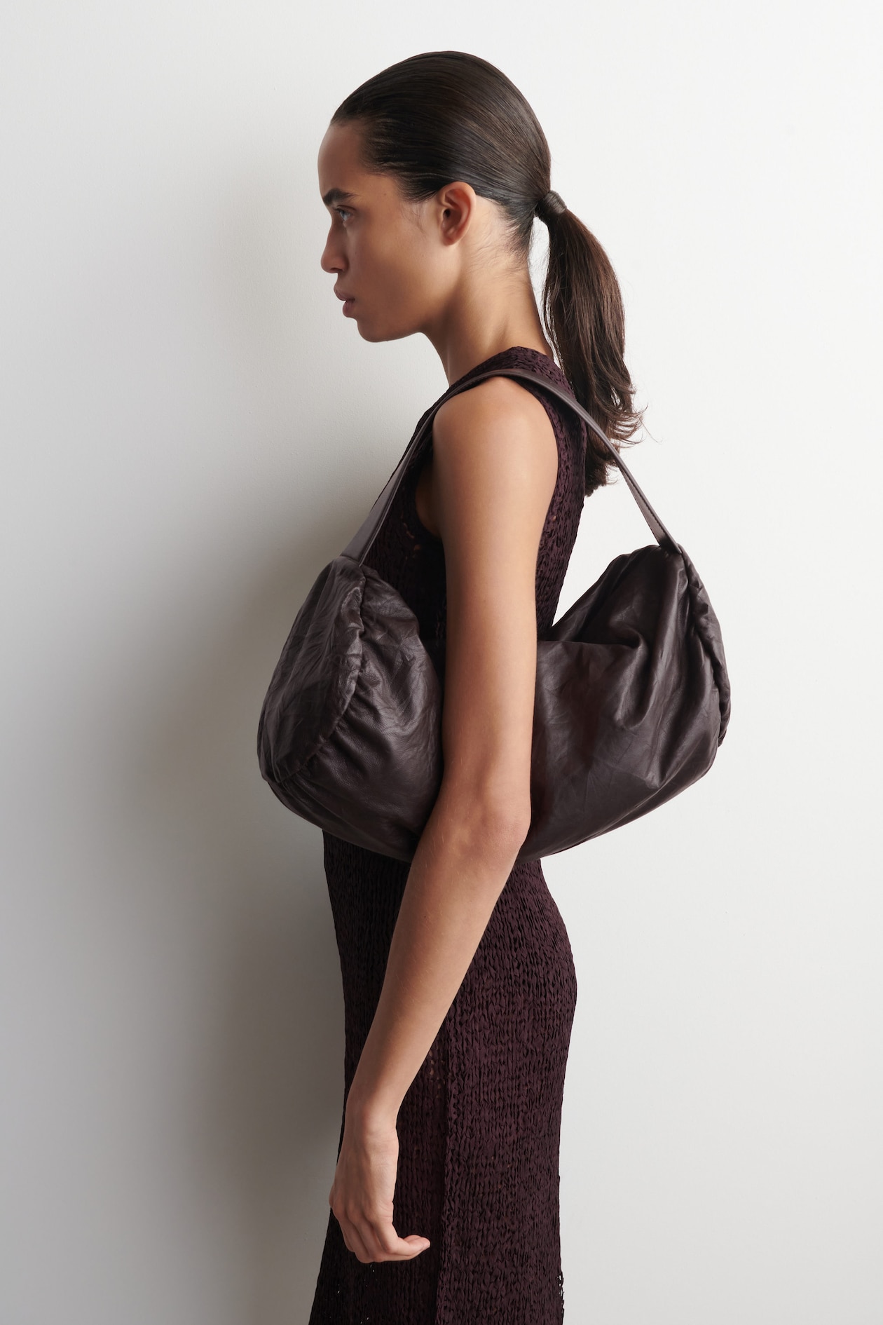 CYLINDER CLUTCH BAG - TEXTURED-LEATHER - BITTER CHOCOLATE | COS