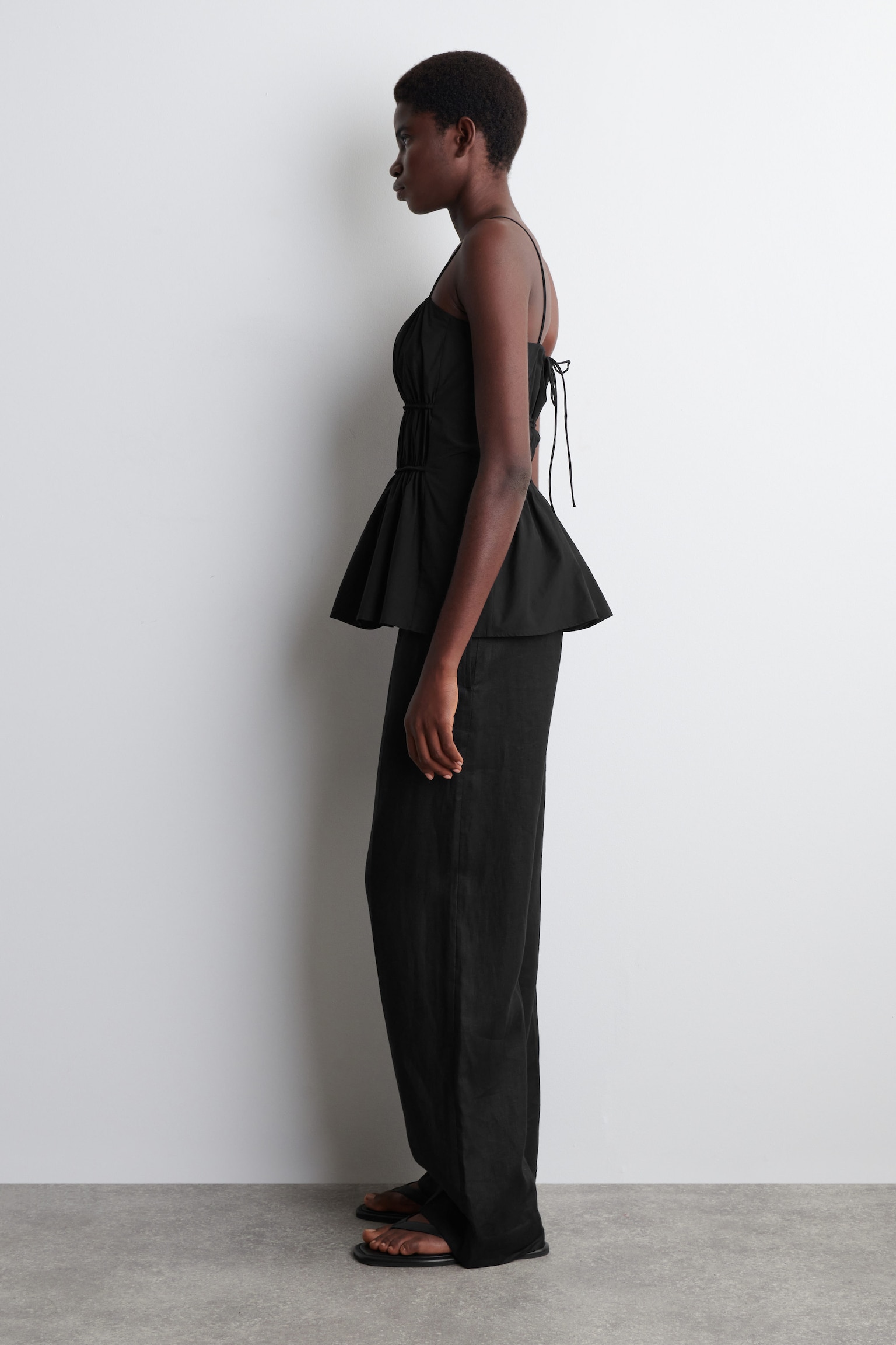 GATHERED COTTON PEPLUM TOP - BLACK | COS