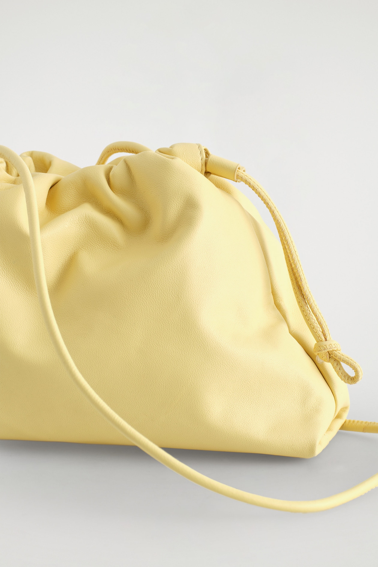 MINI CAVATELLI CLUTCH BAG - LEATHER - BUTTER YELLOW | COS US