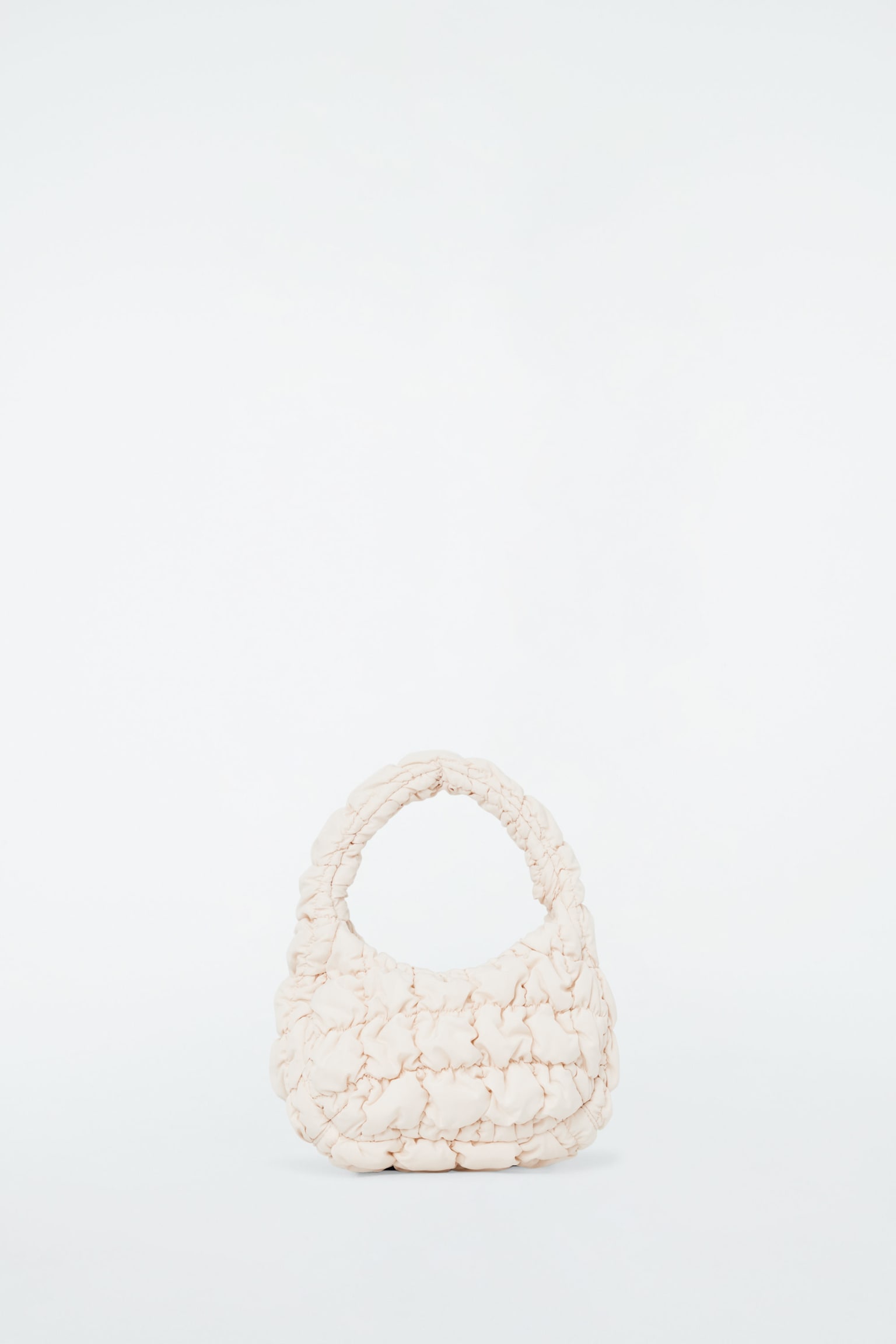THE QUILTED BAG. A COS ICON.