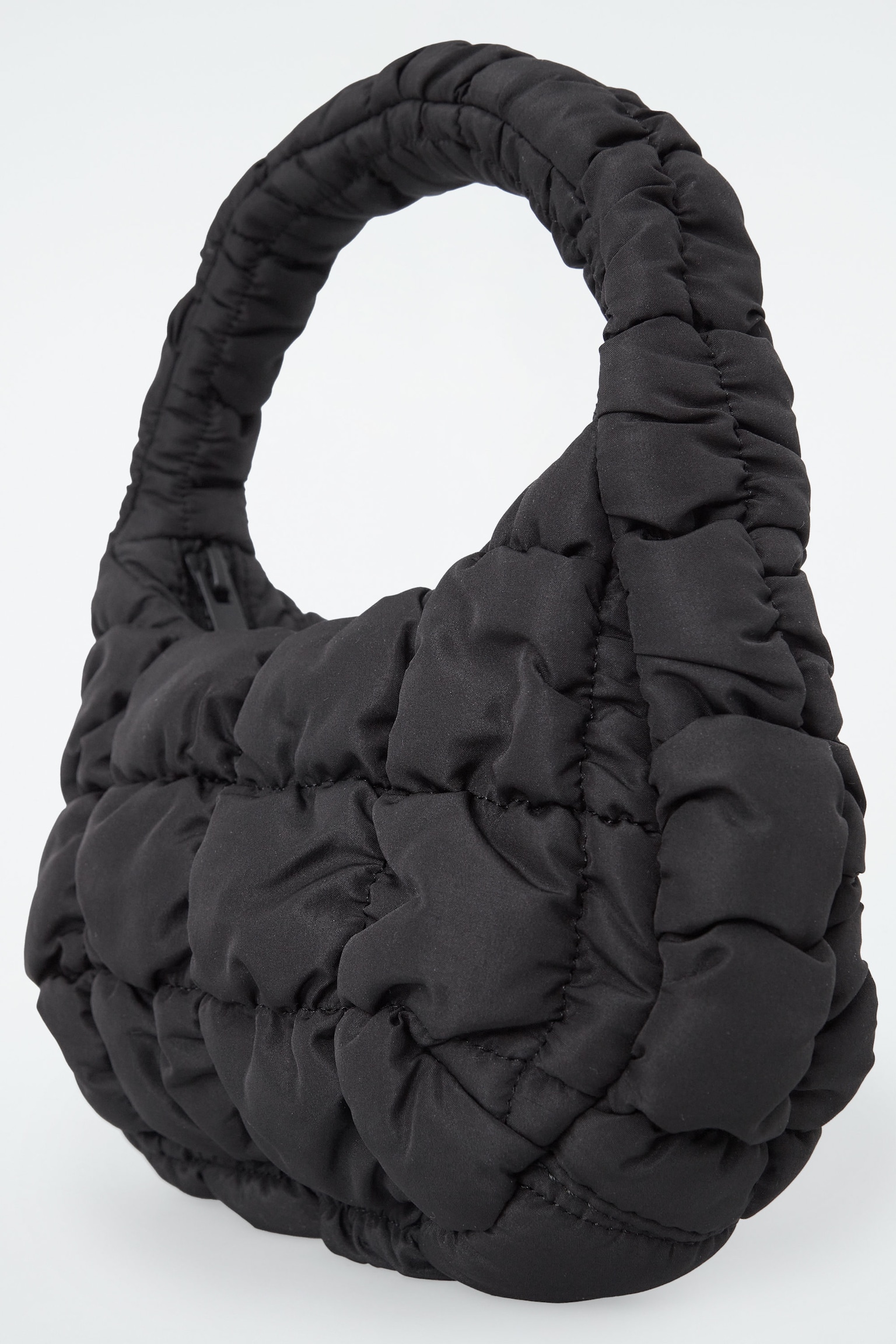 THE QUILTED BAG. A COS ICON.