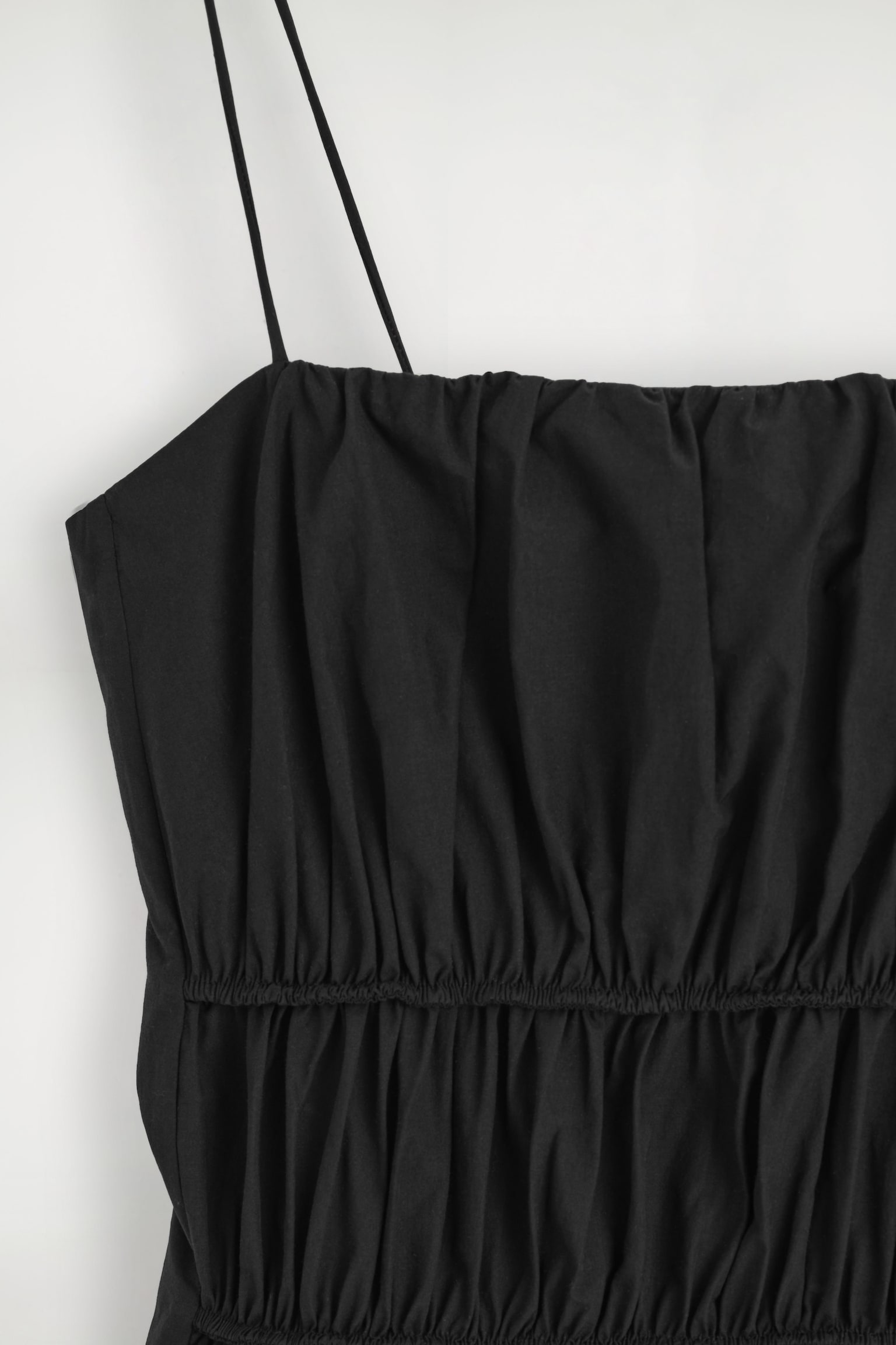 GATHERED COTTON PEPLUM TOP - BLACK | COS