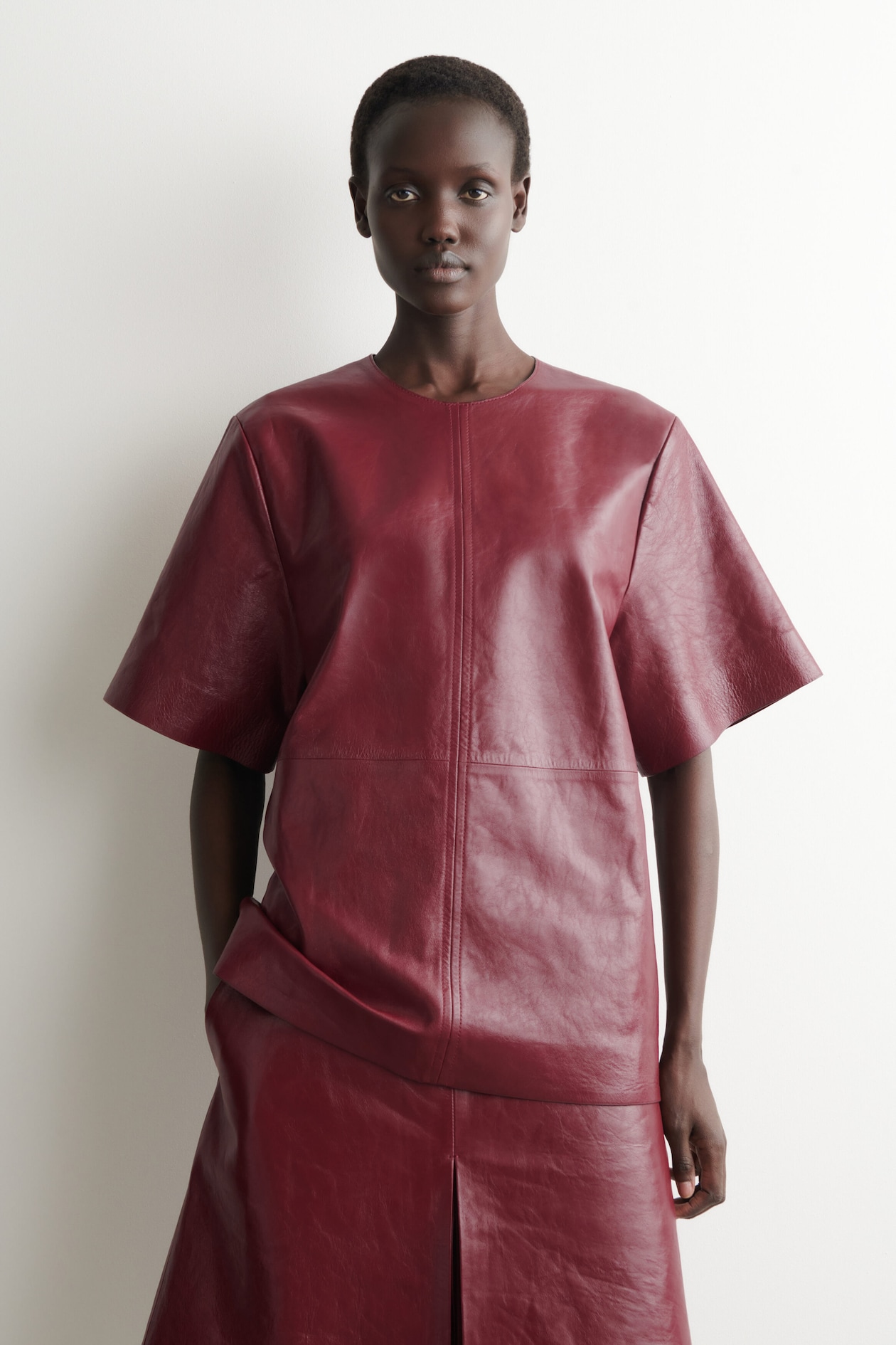 PANELLED TEXTURED-LEATHER T-SHIRT - CRIMSON | COS GB
